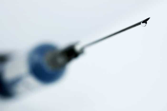 Flushing interval for totally implantable venous access devices